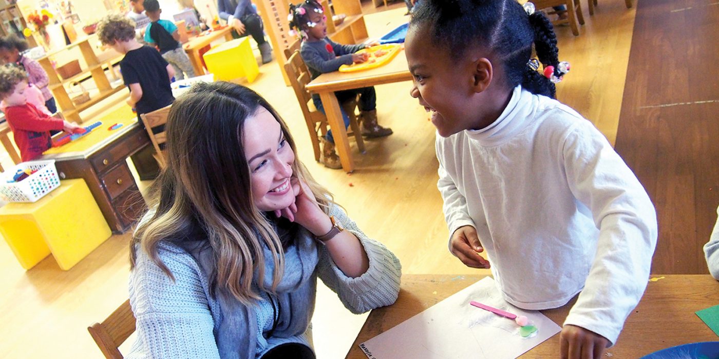 Teacher-laughing-with-student - Early Learning Nation